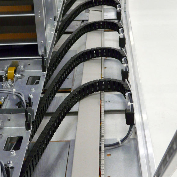 Application of energy chains and cables in chemists picking systems